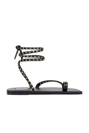 Alaïa Flat Strappy Sandal