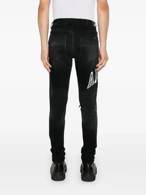 Amiri Varsity Logo Repair Jeans