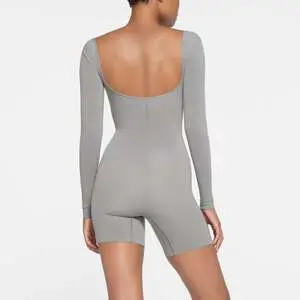 Skims Seamless Sculpt Long Sleeve Low Back Mid Thigh Bodysuit - Pacific |  Editorialist