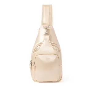 BAGGALLINI Central Park Sling Bag Champagne Puff