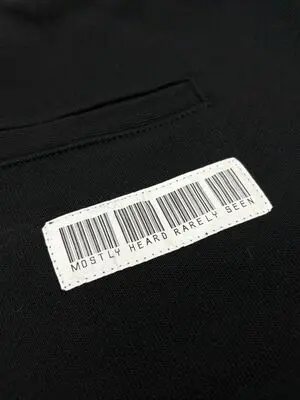 MOSTLY HEARD RARELY SEEN Ripped-up Cotton Sweatpants - Black