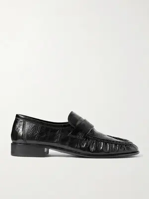THE ROW Soft Paneled Glossed-eel Loafers - Black