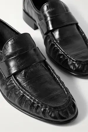 THE ROW Soft Paneled Glossed-eel Loafers - Black