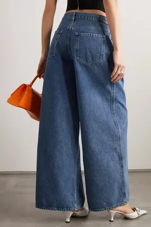 GOLDSIGN The Atticus Pleated Low-rise Wide-leg Jeans