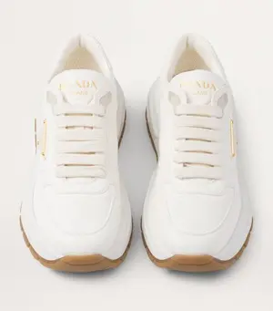 Prada Leather Triangle Sneakers - Neutral