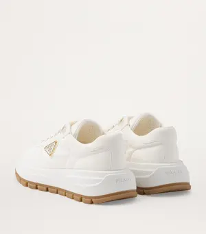 Prada Leather Triangle Sneakers - Neutral