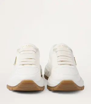 Prada Leather Triangle Sneakers - Neutral