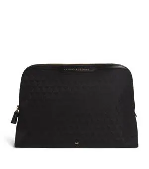 Anya Hindmarch Embossed Clutches