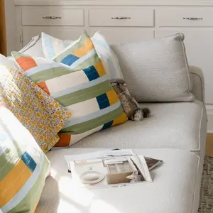 ANCHAL Stamp Throw Pillow