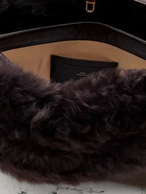 TOTEME T-lock Shearling Shoulder Bag