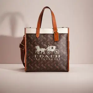 COACH Restored Field Tote With Horse And Carriage Print - Brass/truffle Burnished Amber