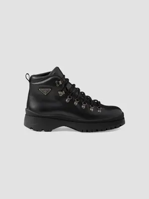 Prada Brixxen Leather Booties - Black