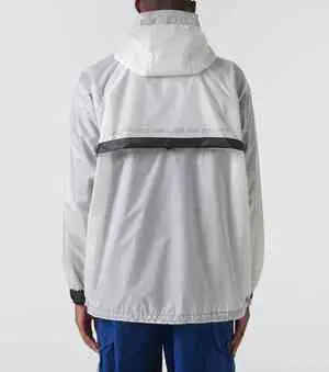 AND WANDER Paneled Raincoat