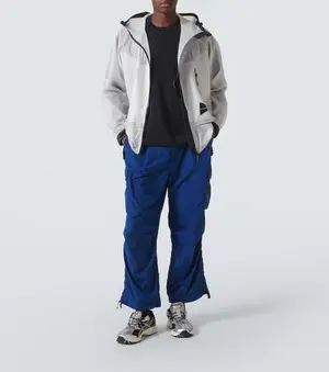 AND WANDER Paneled Raincoat
