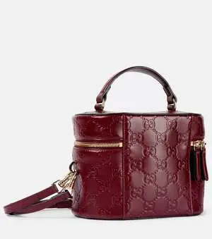 Gucci Gg Embossed Leather Vanity Bag