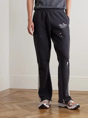 GALLERY DEPT. Flared Paint-splattered Panelled Logo-print Cotton-jersey Sweatpants - Gray