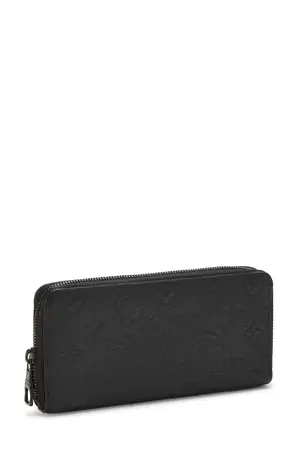 LOUIS VUITTON Monogram Taurillon Zippy Vertical Wallet