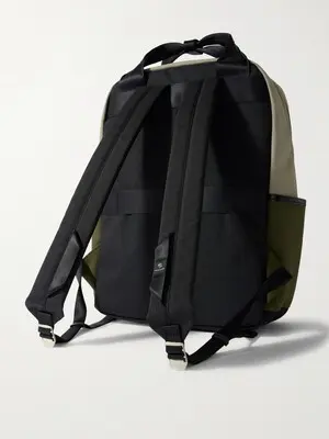 MASTER-PIECE CO Defend Leather-trimmed Coated-canvas Backpack