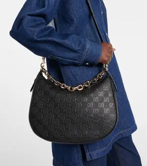 Gucci Gg Embossed Leather Shoulder Bag
