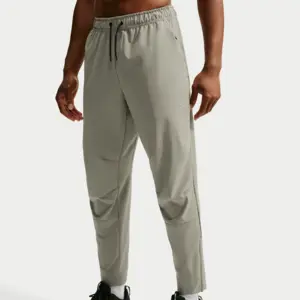 Nike Unlimited Dri-fit Zippered Cuff Versatile Pants - Green