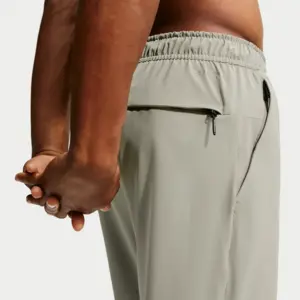 Nike Unlimited Dri-fit Zippered Cuff Versatile Pants - Green