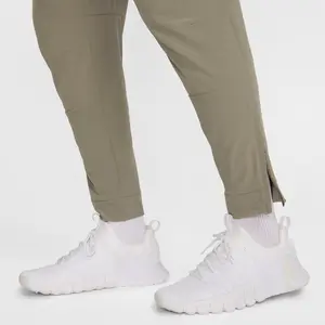 Nike Unlimited Dri-fit Zippered Cuff Versatile Pants - Green