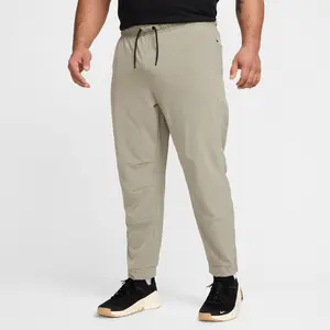 Nike Unlimited Dri-fit Zippered Cuff Versatile Pants - Green