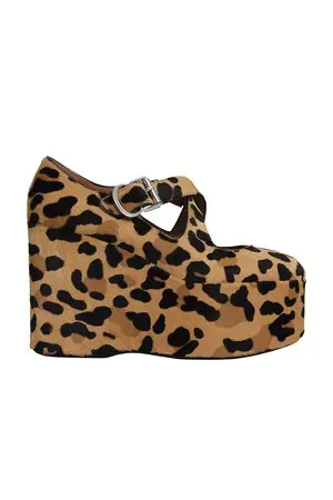Alaia Wedge Pumps