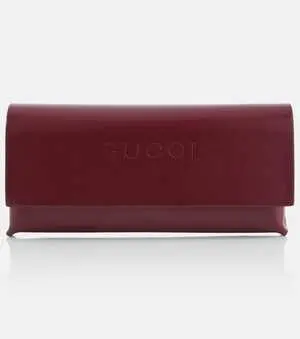 Gucci Logo Embellished Oval Sunglasses