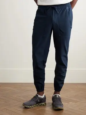 Lululemon License To Train Slim-fit Tapered Stretch Recycled-shell Track Pants - Blue