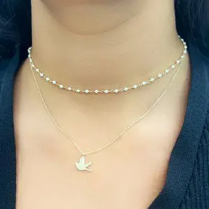 THE LOVERY Gold Dove Pendant Necklace
