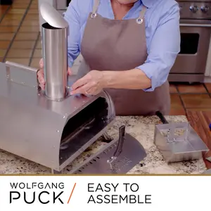 WOLFGANG PUCK Outdoor Pizza Oven, Durable Stainless Steel, Portable Pizza Oven, Compact Storage