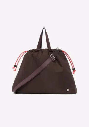 PELOTON Cinch Sack Crossbody Bag - Cocoa