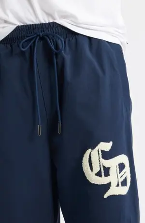 CRIMINAL DAMAGE Logo Appliqué Track Pants - Navy/ecru