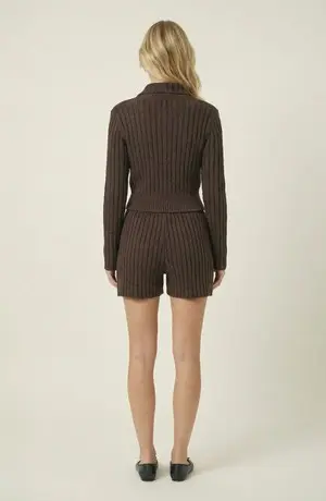 MODENAIRE Ribbed Knit Romper With Bow Tie Front And Long Sleeves