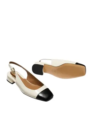MARGAUX LONNBERG The Cap-toe Darcy Slingback Pumps - Cream And Black Calf