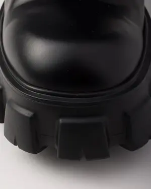 Prada Monolith Brushed Leather And Re-nylon Boots With Pouch