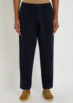 Universal Works Relaxed Tapered-leg Wool-blend Trousers