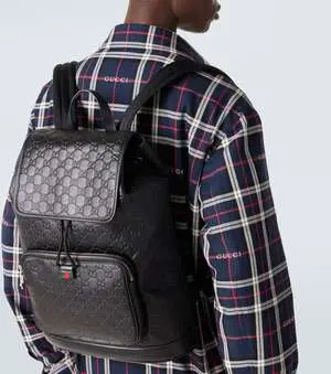 Gucci Gg Medium Leather Backpack - Black