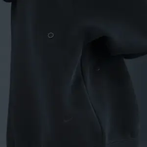 Nike Tech Pullover Hoodie With Reflective Accents