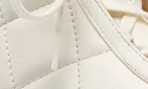 STUART WEITZMAN Hudson Quilted Lug Sole Bootie - Cream