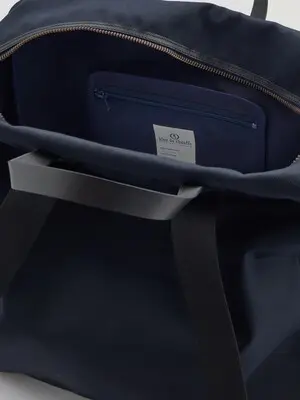BLEU DE CHAUFFE Leather-trimmed Waxed Cotton-canvas Weekend Bag