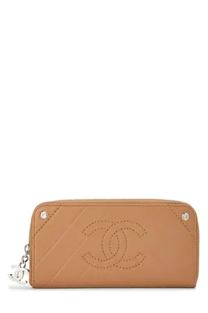 Chanel Calfskin Chevron Zip Around Wallet - Brown