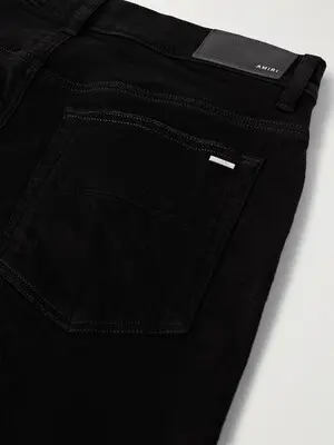 Amiri Mx1 Skinny-fit Leather-paneled Distressed Jeans