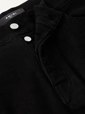 Amiri Mx1 Skinny-fit Leather-paneled Distressed Jeans