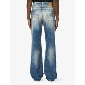 Amiri Slashed Boot-cut Denim Jeans
