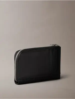 Calvin Klein Embossed Allover Monogram Zip Wallet