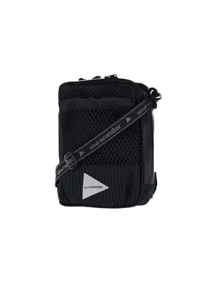 AND WANDER Reflective Crossbody Pouch Bag