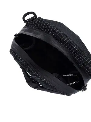 AND WANDER Reflective Crossbody Pouch Bag