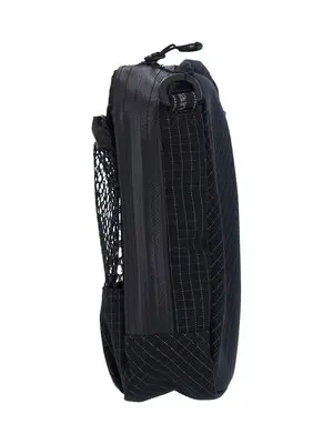 AND WANDER Reflective Crossbody Pouch Bag
